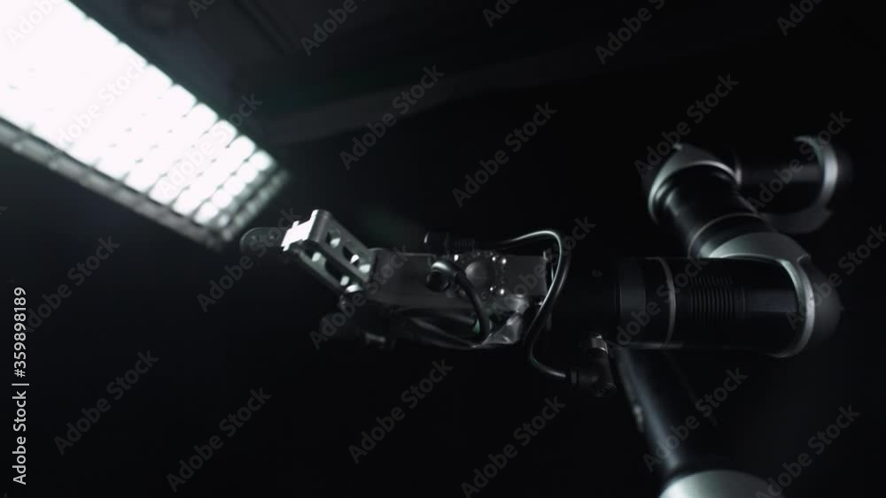 Futuristic robot arm moves randomly in space, system failure, mad robot ...