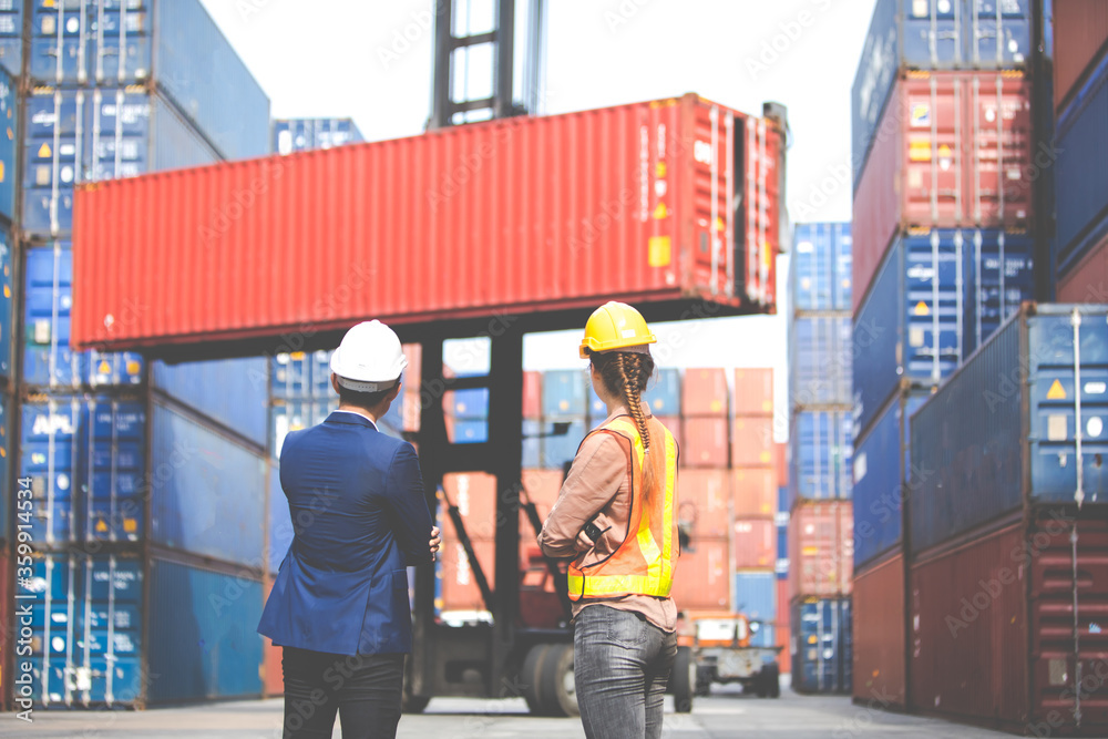 Man manager and woman Supervisor dock cargo checking and control ...