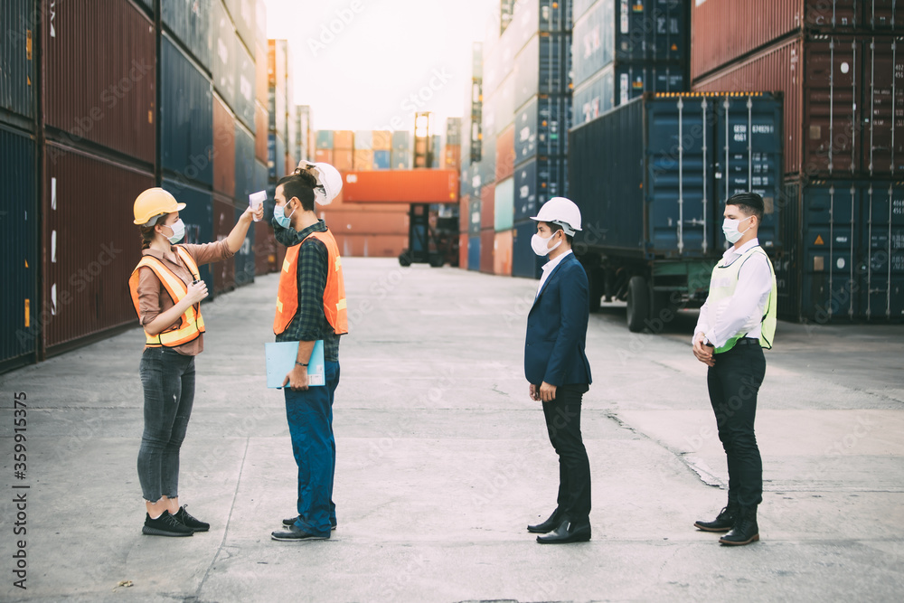 Temperature measurement with employee temperature meter before entering ...