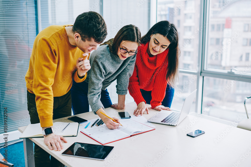 Collaboration of young professionals on creating design of new project ...