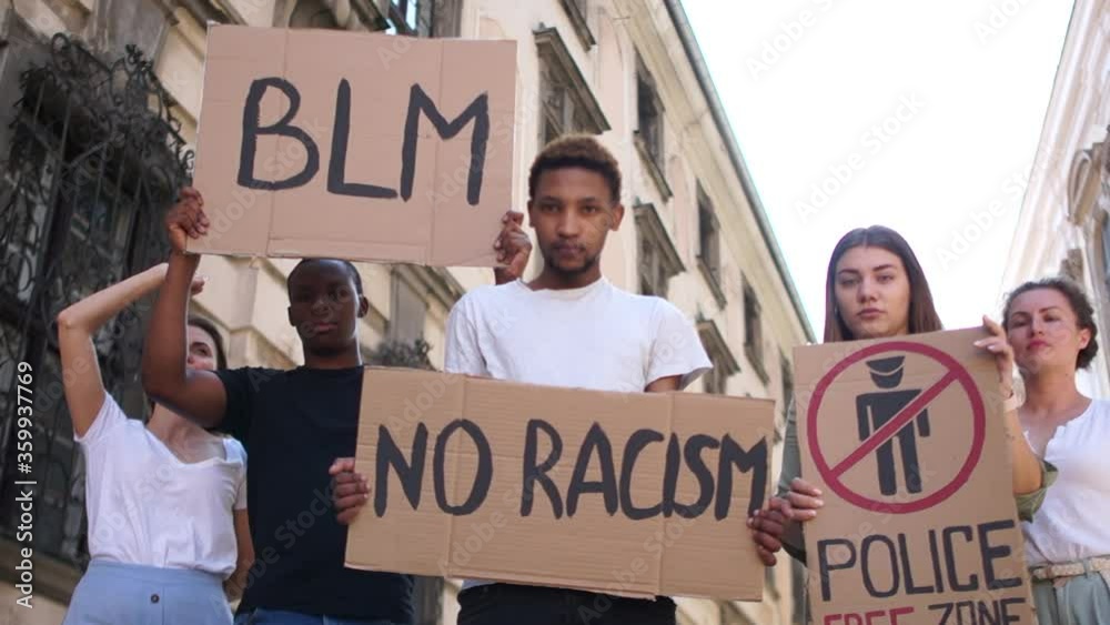 Multiracial group of people with posters BLM, police free zone, no ...