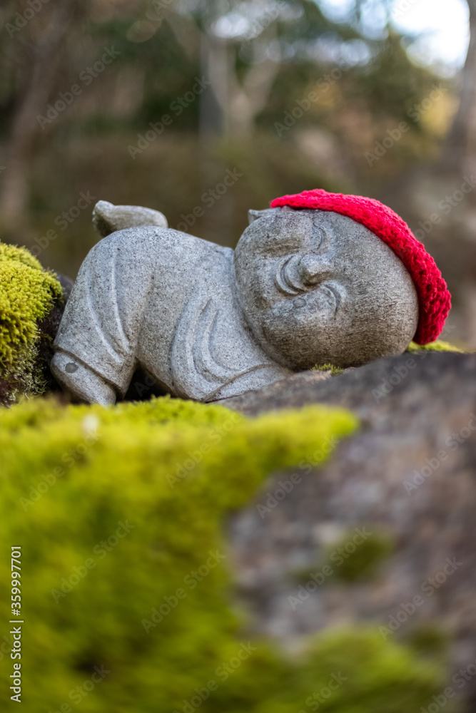 Jizo Buddhist statues with red cap at Daisho-in Temple, Miyajima, Japan ...