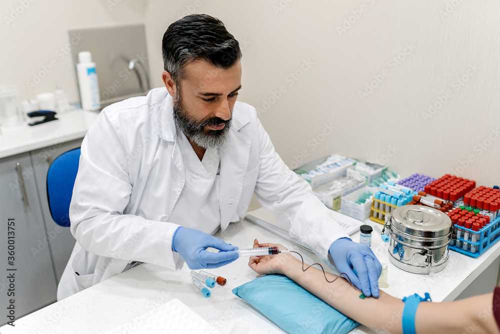 Blood draw in a hospital Stock Photo | Adobe Stock
