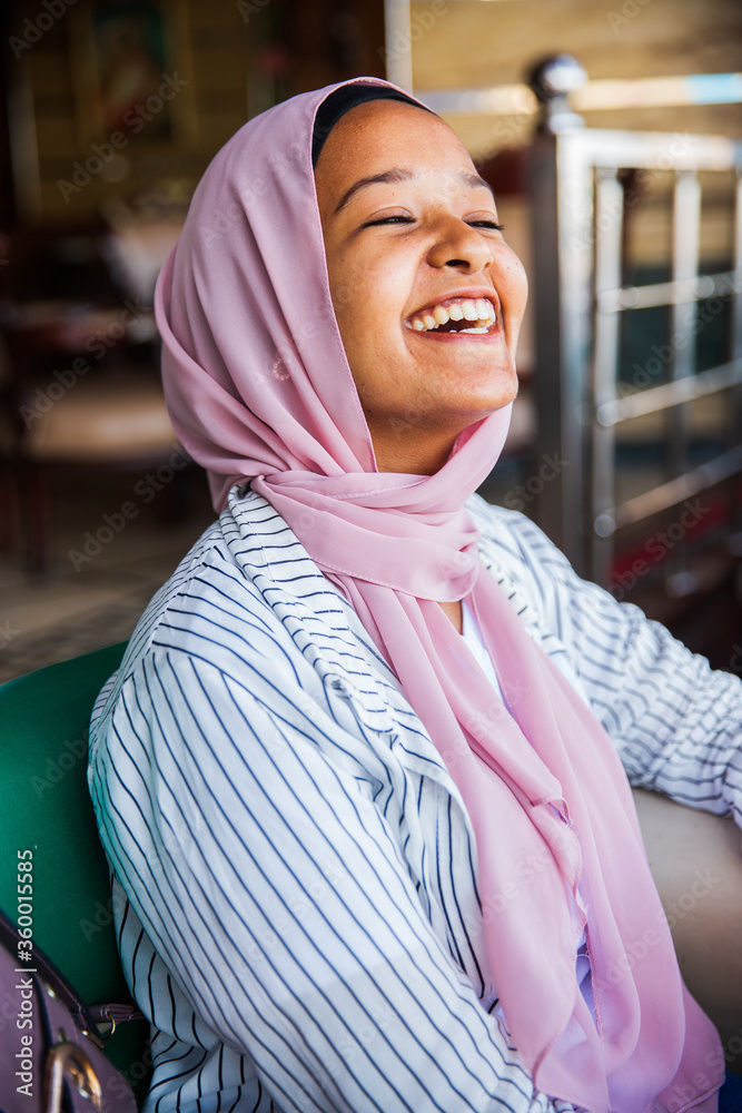 Ghada Laughing Stock Photo | Adobe Stock