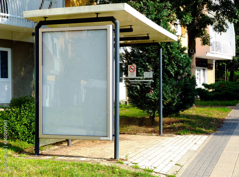 bus shelter at bus stop. white poster ad display. background for mock ...