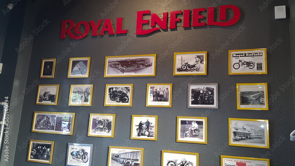 Royal Enfield motorcycle logo sign on indian dealership with motorbike ...
