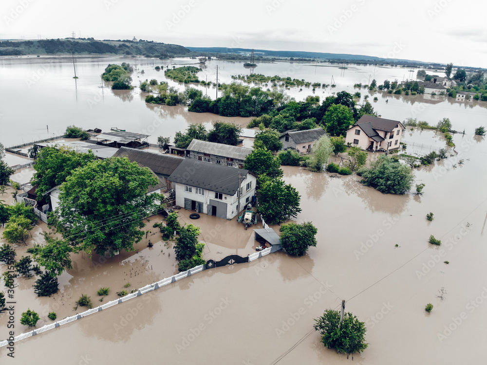 Flooded village on Ukraine. Natural disaster in Halych, courtyards and ...