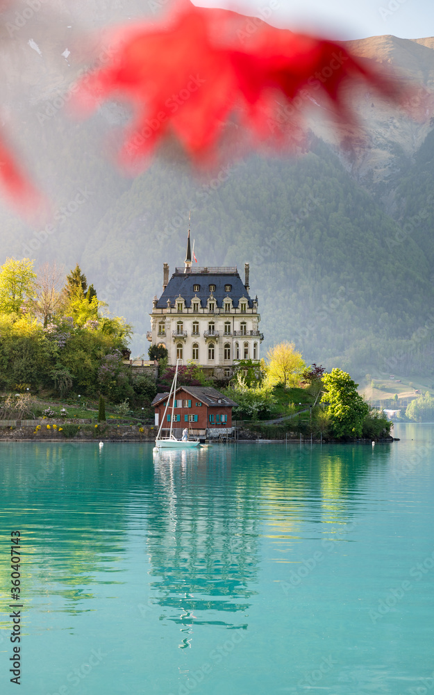 view of Schloss Seeburg, Iseltwald in turquoise Lake Brienz Stock Photo ...