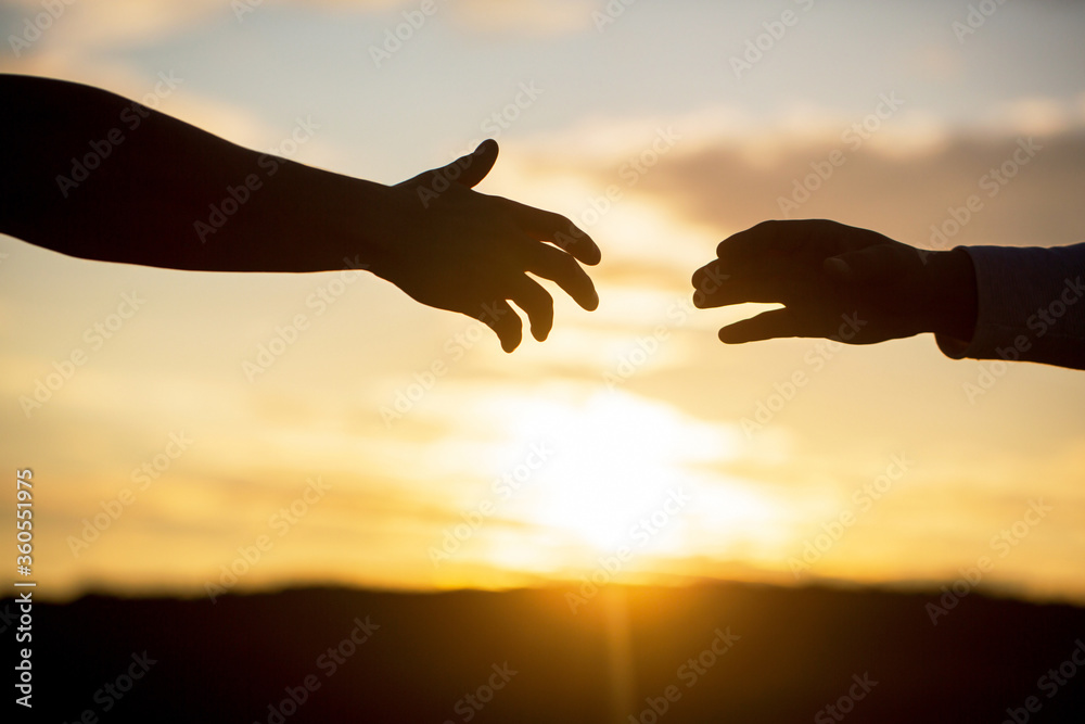 Giving a helping hand. Friendly handshake, friends greeting, teamwork, friendship. Rescue ...