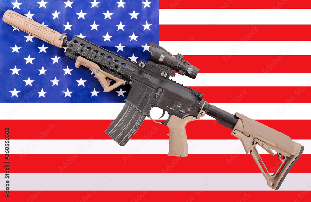 Modern military automatic carbine M4A1 against the background of the ...