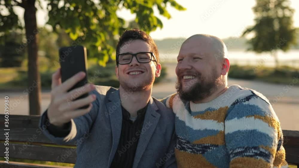 Cute Gay Couple Pose For Selfie With A Kiss On The Cheek vídeo de Stock ...