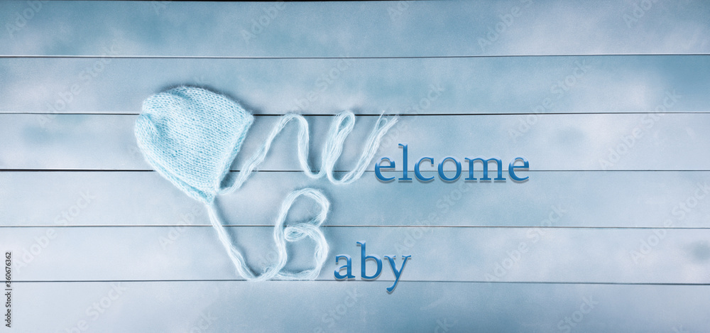 Welcome baby boy on wood background. Baby shower, birthday, invitation ...