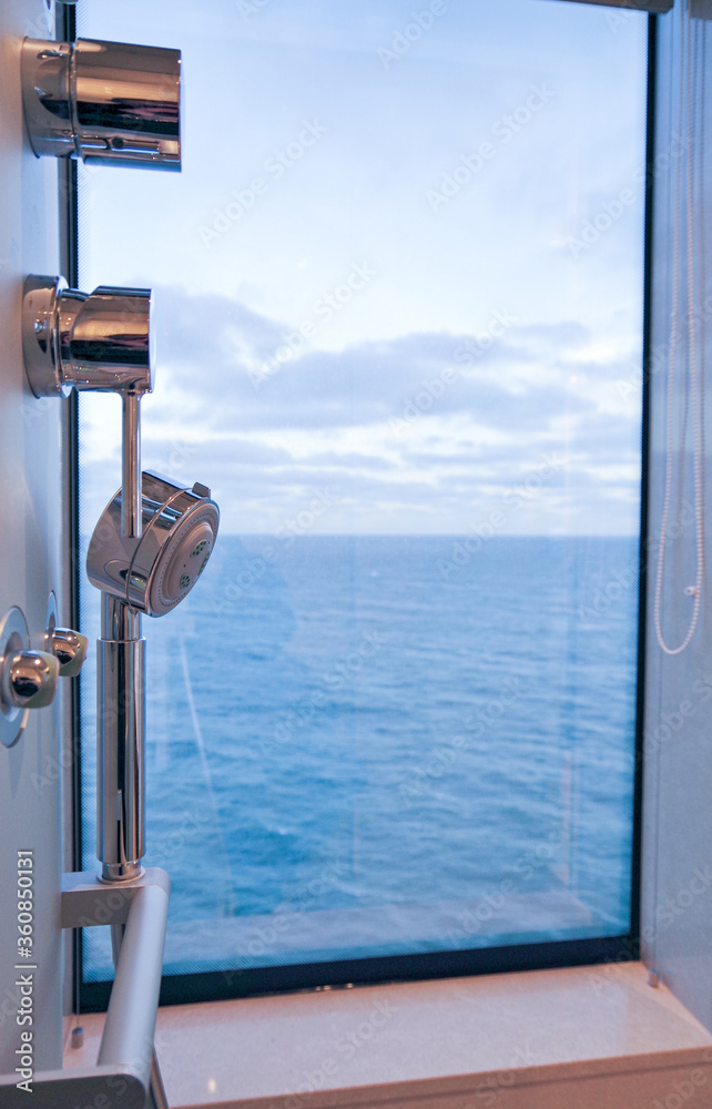 Amazing ocean views from rain shower inside bathroom of suite onboard ...