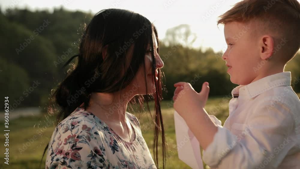 Parent like little son outdoor, woman and child having fun together ...