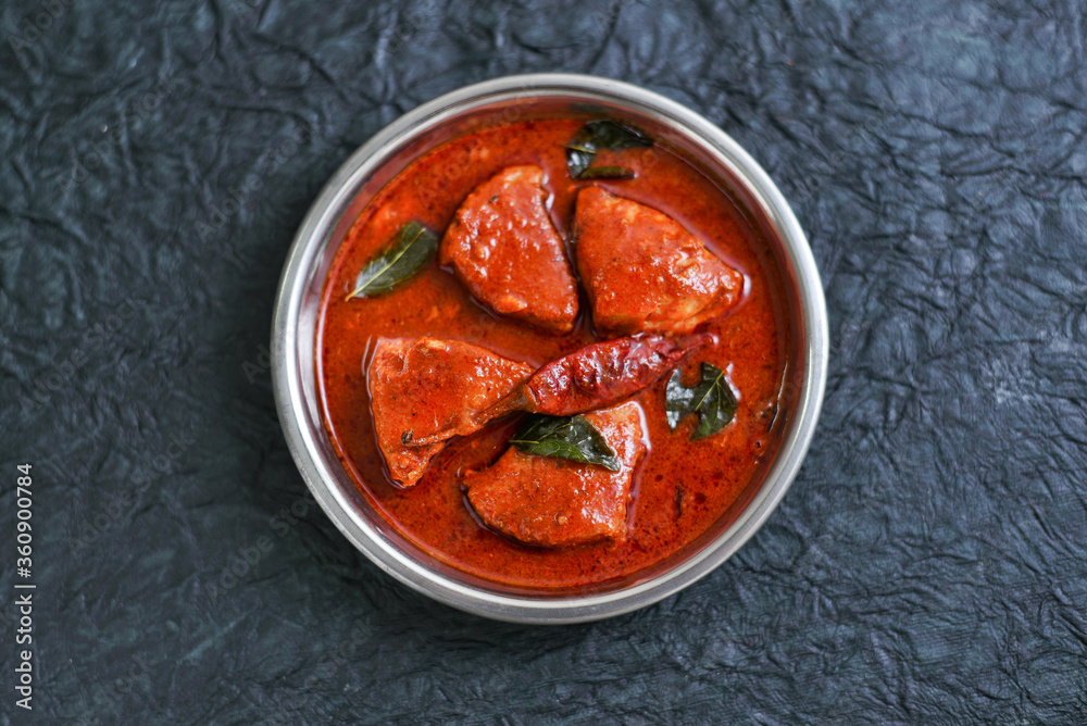Kerala red fish curry is a hot and spicy seafood cuisine masala gravy ...