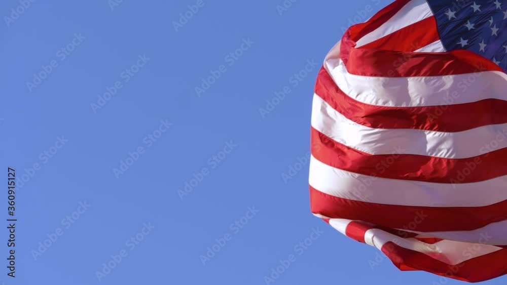 American USA flag closeup with copy space, slow motion. USA flag ...