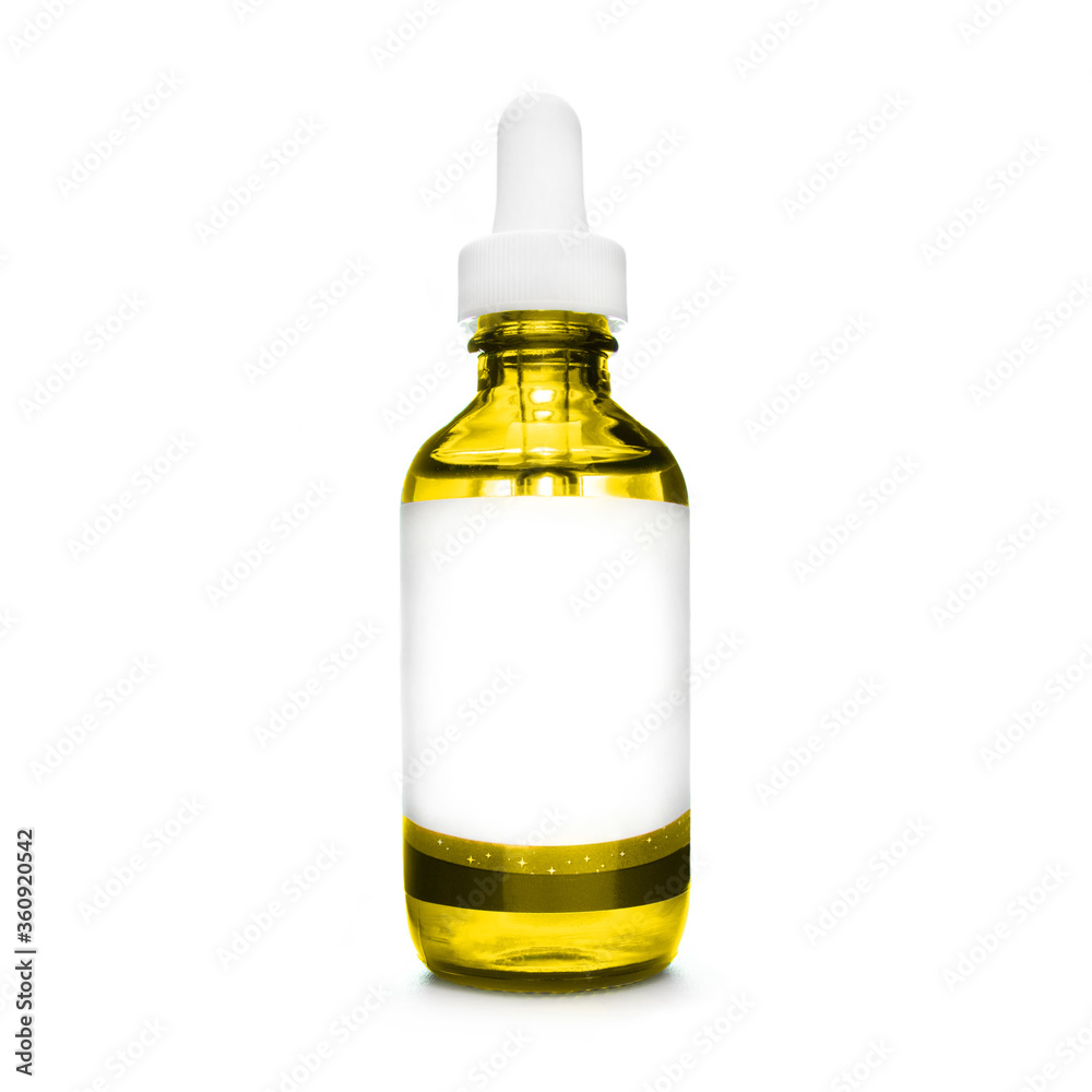 yellow bottle with pipette. dropper bottle with serum. cosmetic oil on ...
