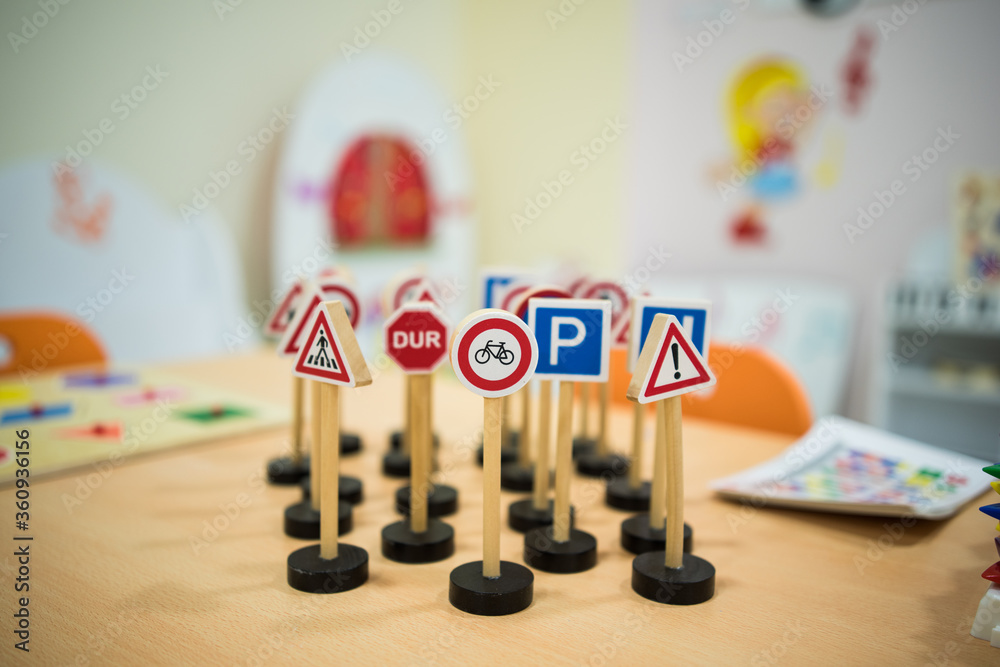 Little children`s road signs. Training children in road traffic ...