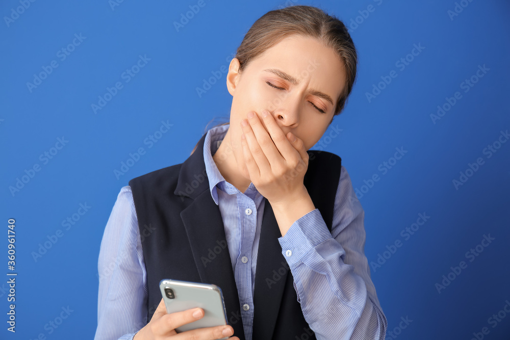 Tired woman with mobile phone on color background. Concept of sleep ...