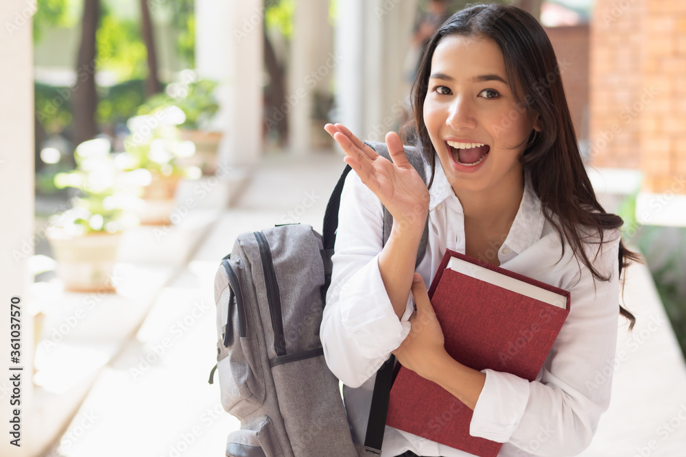 happy excited asian woman student in university campus Stock Photo ...