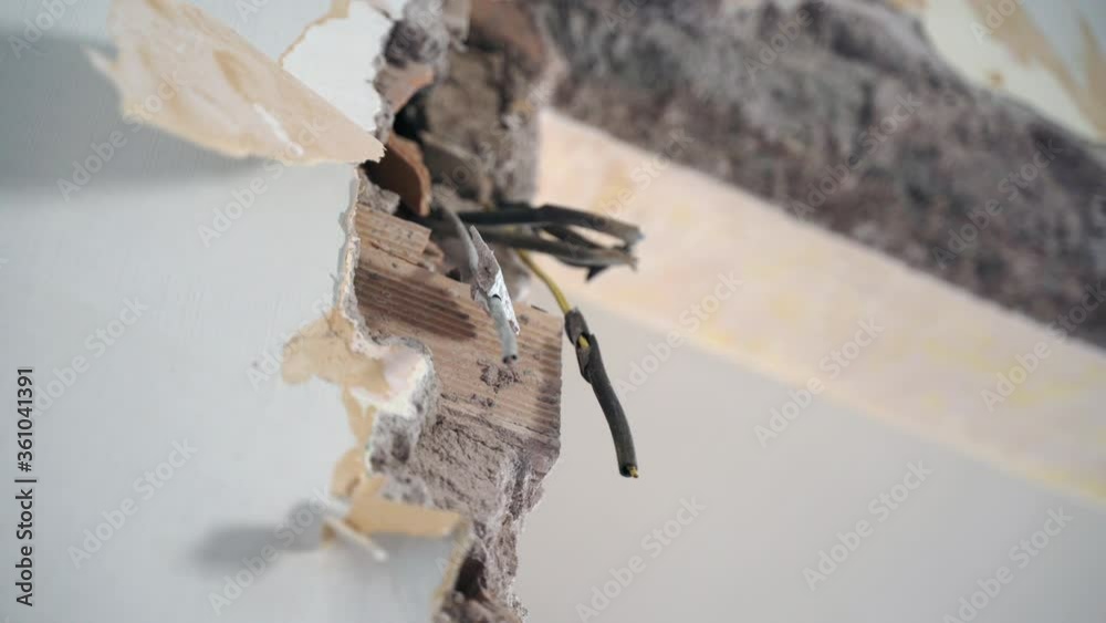 Wideo Stock: Wires twisted with insulting tape hanging from the ...