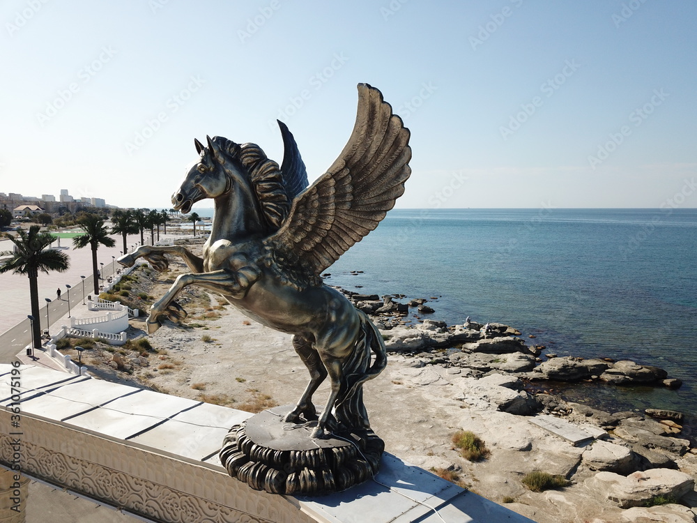 Statue flying horse pegasus a greek mythology figure on the roof of ...
