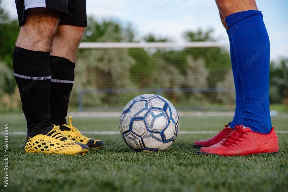 feet of soccer players before starting a match Stock Photo | Adobe Stock
