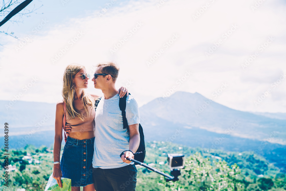 Romantic couple looking on each other with love posing for picture on ...