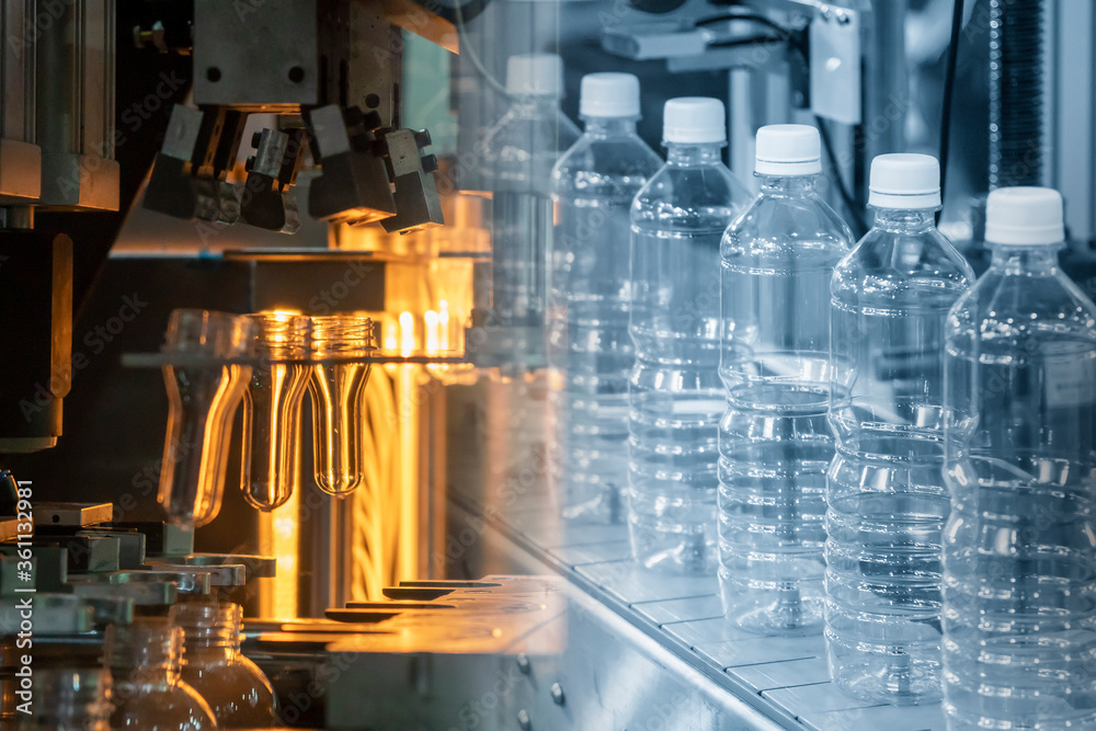 The abstract scene of tube preform shape of bottles preheat process and ...