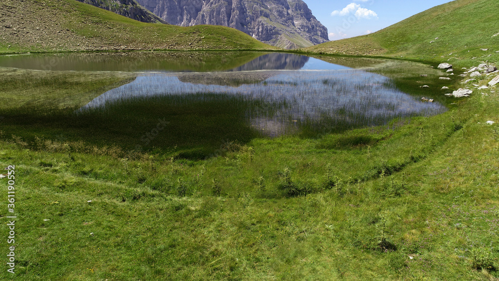 Aerial drone photo from iconic and beautiful lake Drakolimni of Tymfi ...