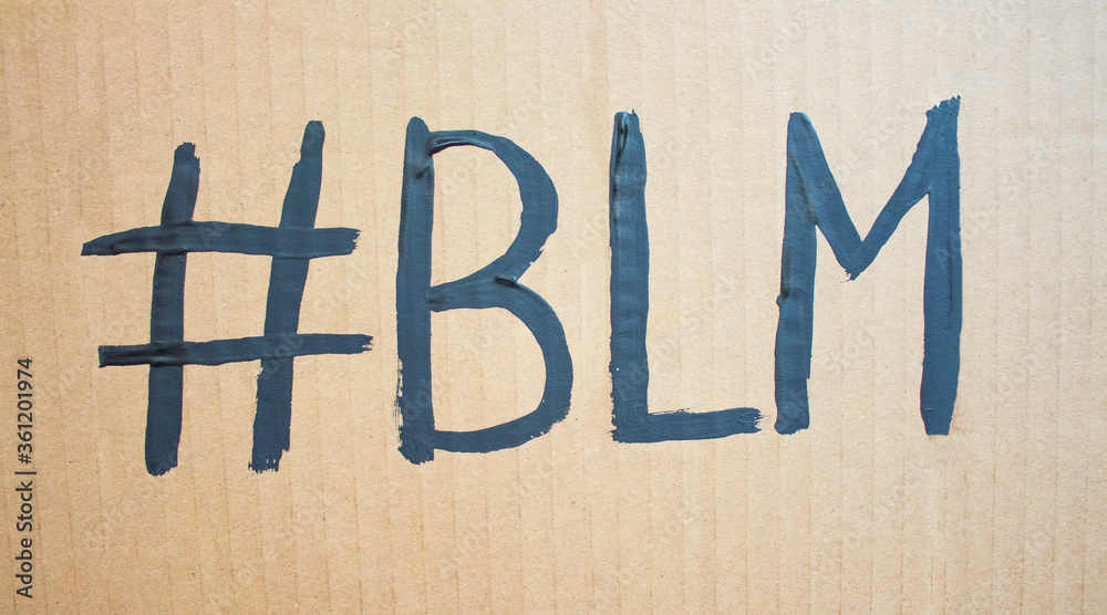 #BLM Text message for protest on cardboard. Stop racism. Police ...