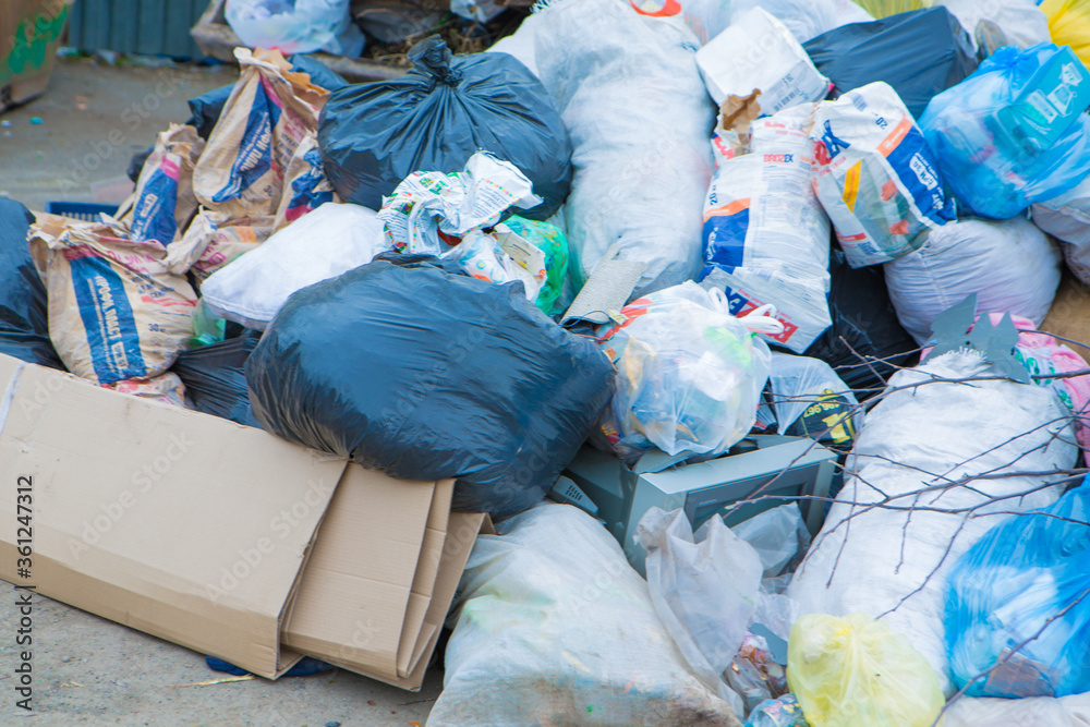 pile of waste in a container. garbage collapse. Janitors ' strike ...