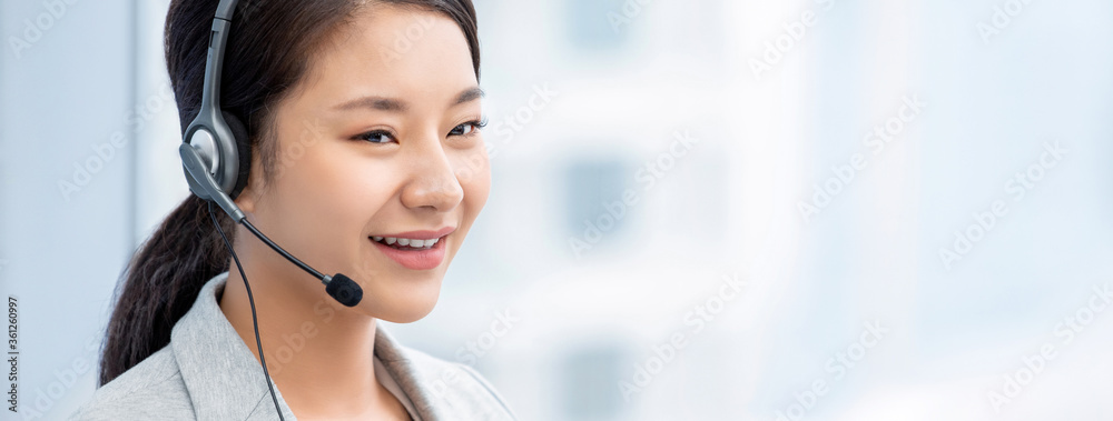 Banner.of smiling beautiful Asian female customer service operator ...