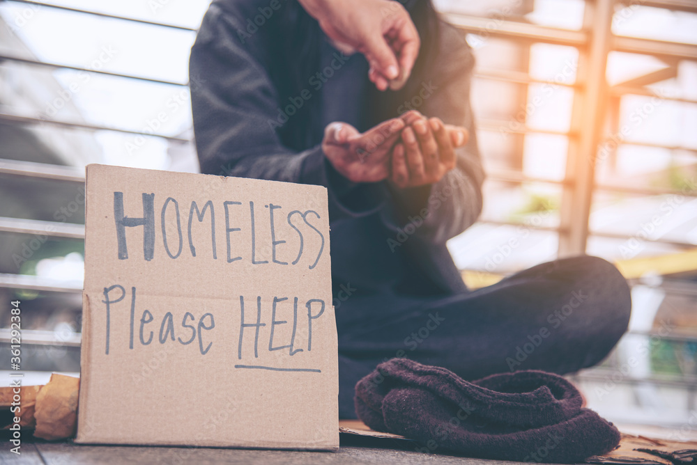 Woman helping hands to homeless people poverty beggar man holding hands ...