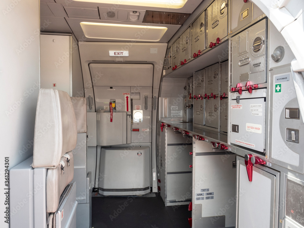 Aircraft aft galley with full of storage unit. The most right unit show ...