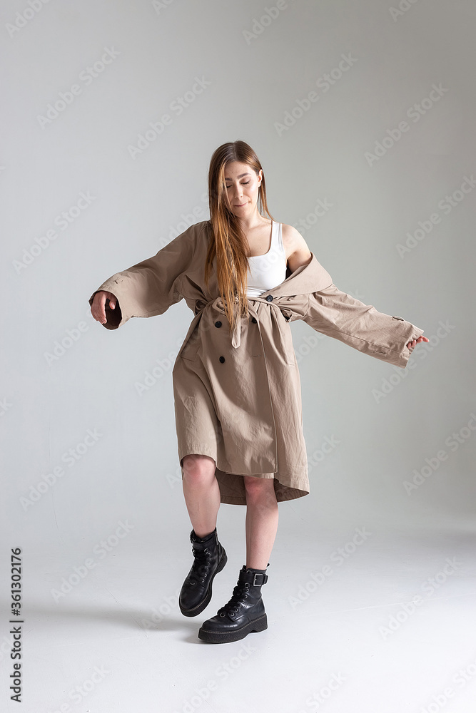 attractive caucasian skinny girl with long hair posing on white ...