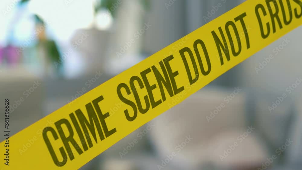 Vidéo Stock Crime scene do not cross yellow tape in 4k slow motion ...