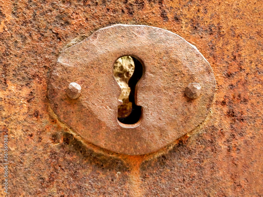 Close up of the keyhole of a medieval door lock, located at Chateau de ...