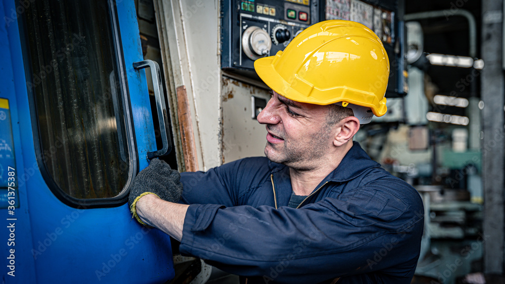 Factory worker got his arm stuck in the machine. Workplace accident ...