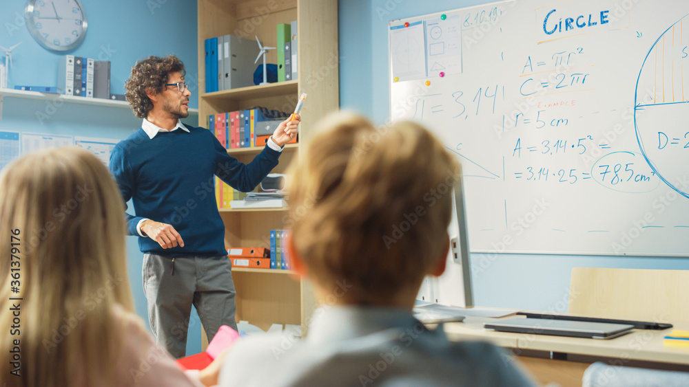 Teacher Explains Lesson to a Classroom Full of Bright Diverse Children ...