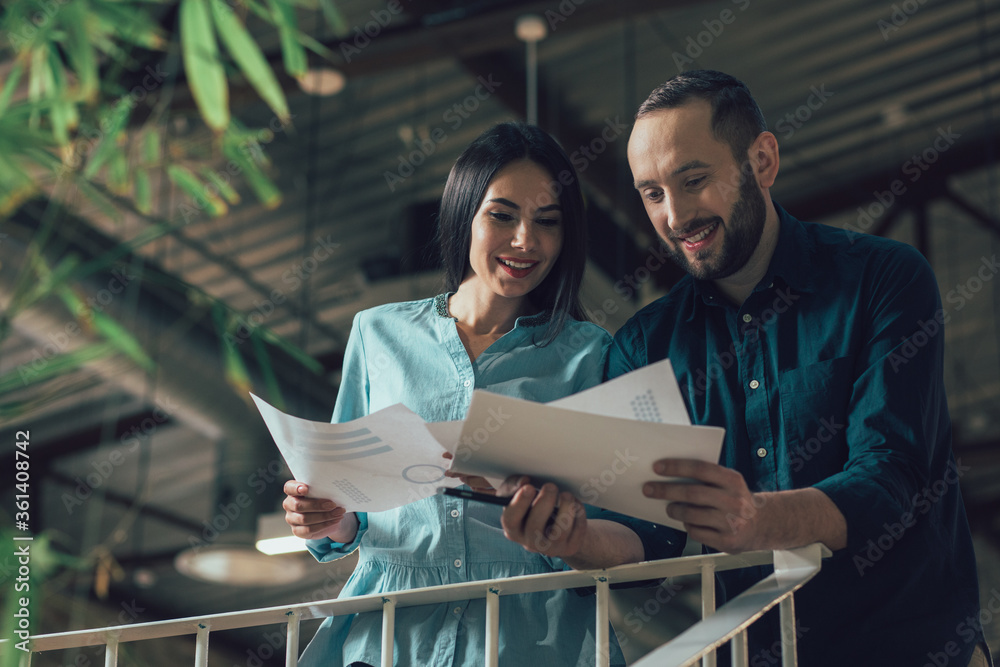 Two positive colleagues planning their working day Stock Photo | Adobe ...