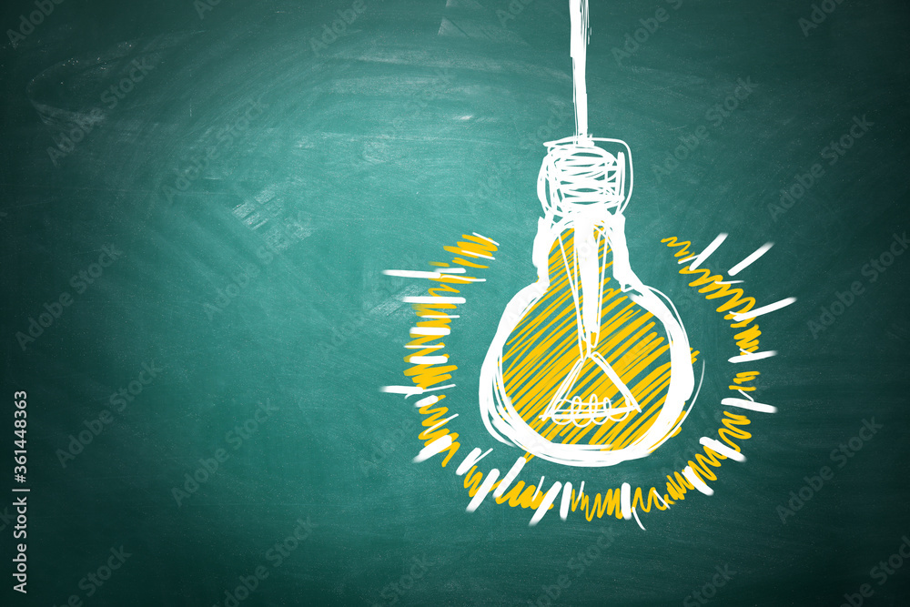 Light bulb drawing as symbol of idea on green chalkboard Stock Photo ...