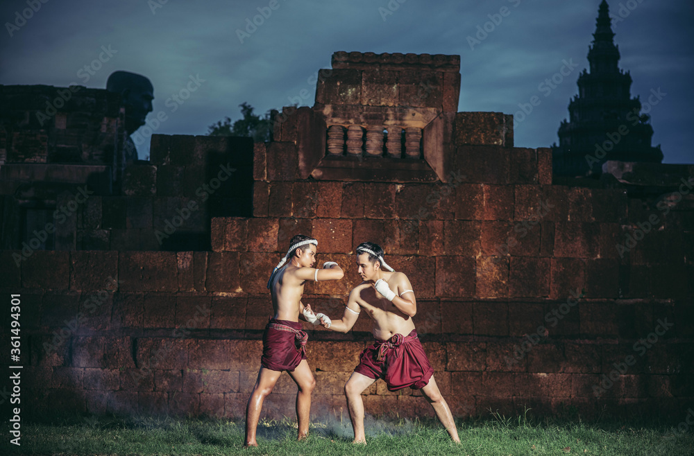 Two boxers fight with the martial arts of Muay Thai. Stock Photo ...