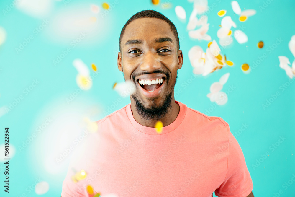 Portrait of a cheerful black man laughing looking at camera with ...