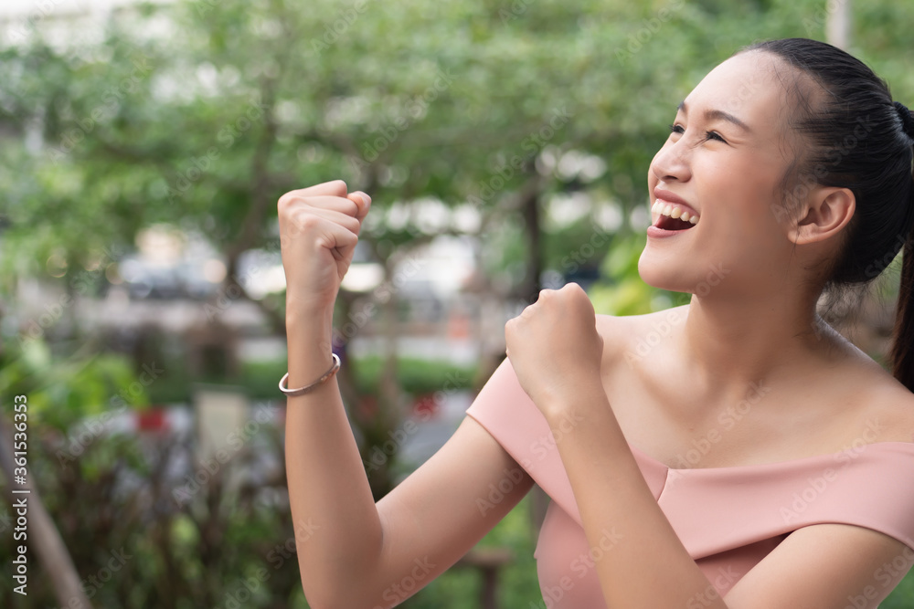 Fotografia do Stock: strong winning excited southeast asian woman face ...