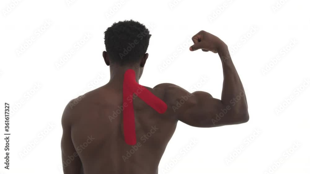 Vidéo Stock Back view of unrecognizable African sportsman lifting hand ...