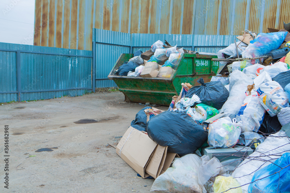 pile of waste in a container. garbage collapse. Janitors ' strike ...