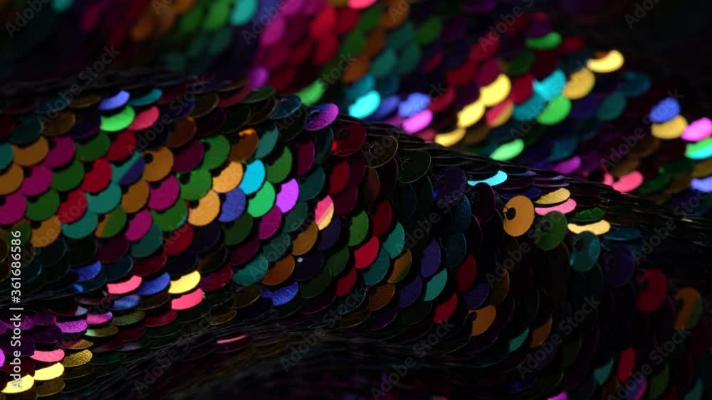 Beautiful shiny multi-colored background of sequins and bokeh. Festive ...