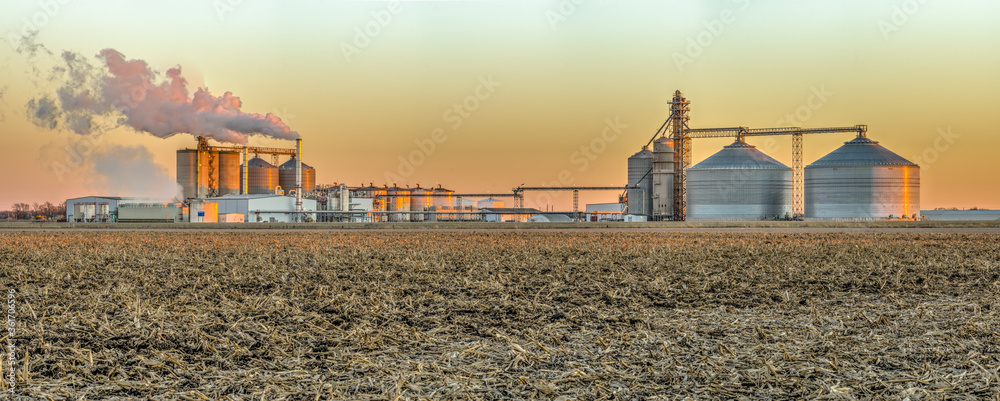 Ethanol plant in an agricultural landscape. Stock Photo | Adobe Stock