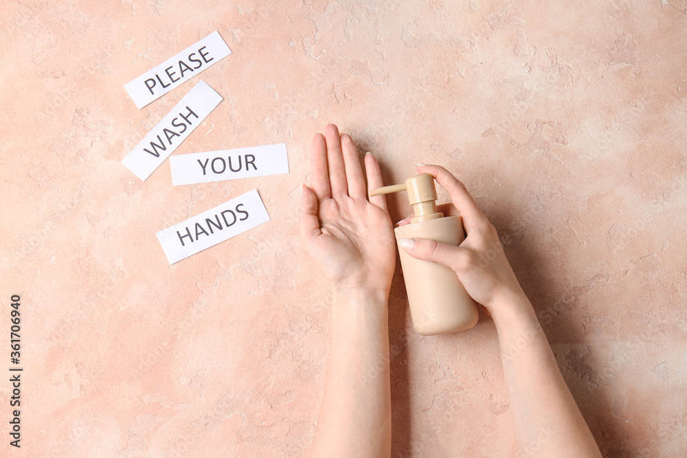 Text PLEASE WASH YOUR HANDS and woman applying liquid soap on her hand ...